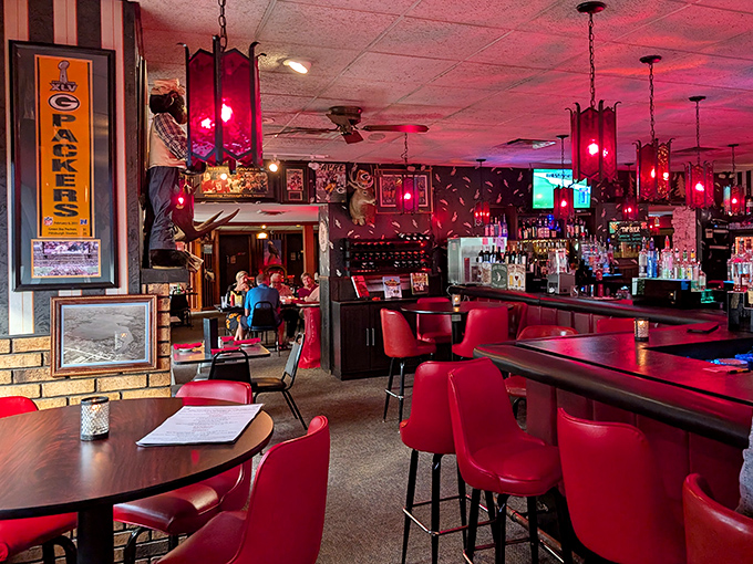 The bar glows like a ruby sunset, promising stories and spirits in equal measure.