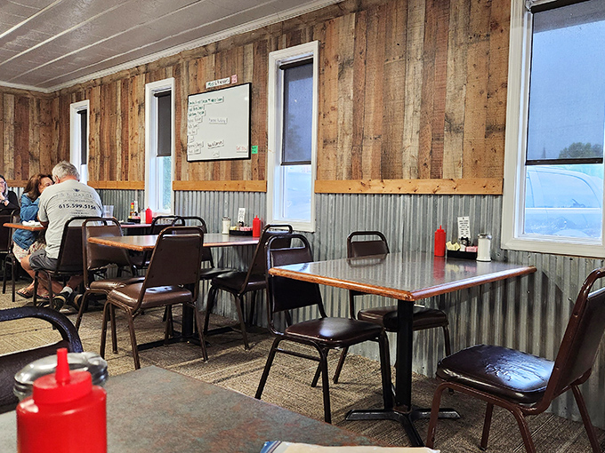 Wood paneling and corrugated metal create that distinctive "we've-been-here-forever" vibe that no corporate restaurant designer could authentically replicate.