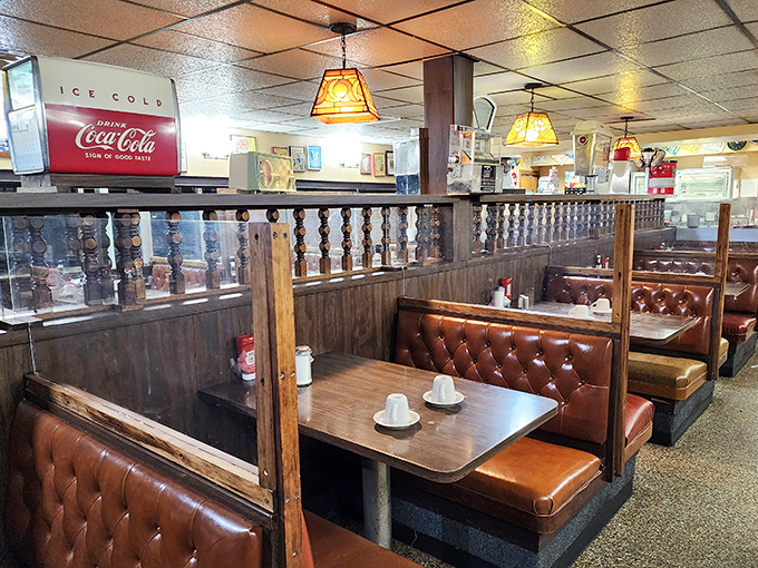 Classic diner booths where countless life decisions have been made over coffee refills and the promise of pancakes to come.