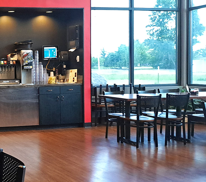 Bright windows flood this corner with natural light, creating the perfect backdrop for both your meal and the inevitable food photos you'll take.