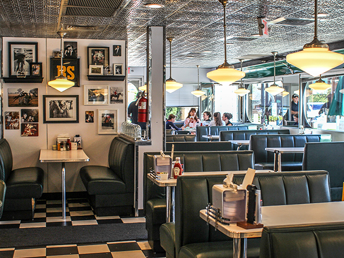 Green booths line the walls like faithful sentinels, witnessing countless first dates, family celebrations, and "just because" meals over the years.