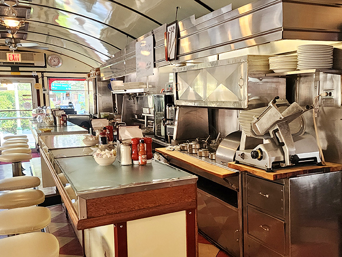 Stainless steel gleams under vintage lighting, while the kitchen hums with the symphony of sizzling, clanking, and occasional friendly banter that makes diners magical.