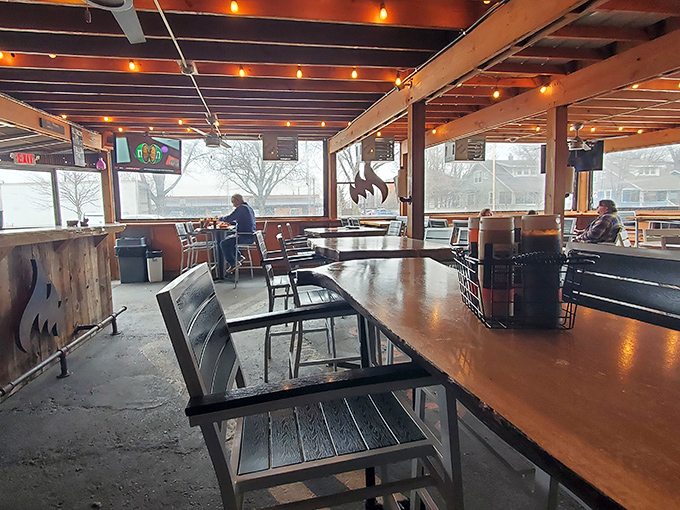 Another angle reveals the spacious interior where BBQ pilgrims gather to worship at the altar of slow-smoked perfection.