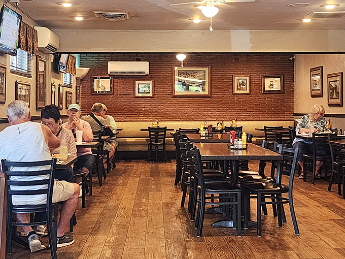 Another angle of Clyde's interior reveals the thoughtful balance of comfort and simplicity that keeps generations of diners returning.