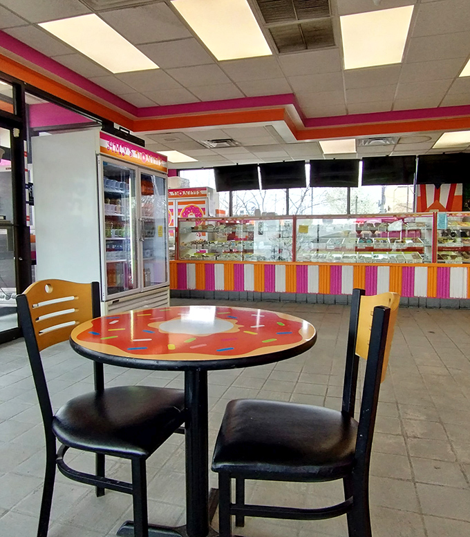 Inside, the donut-shaped tables aren't just furniture—they're a reminder of your purpose here. Focus, people.