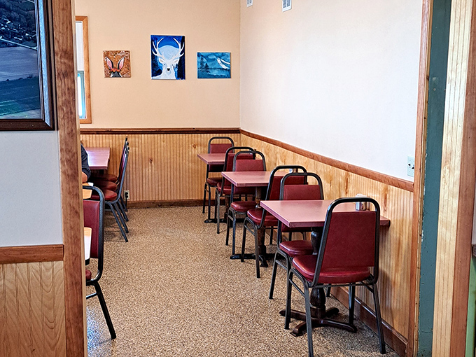 No designer needed for this dining room&mdash;just honest wood paneling, simple tables, and chairs that have supported generations of satisfied diners.