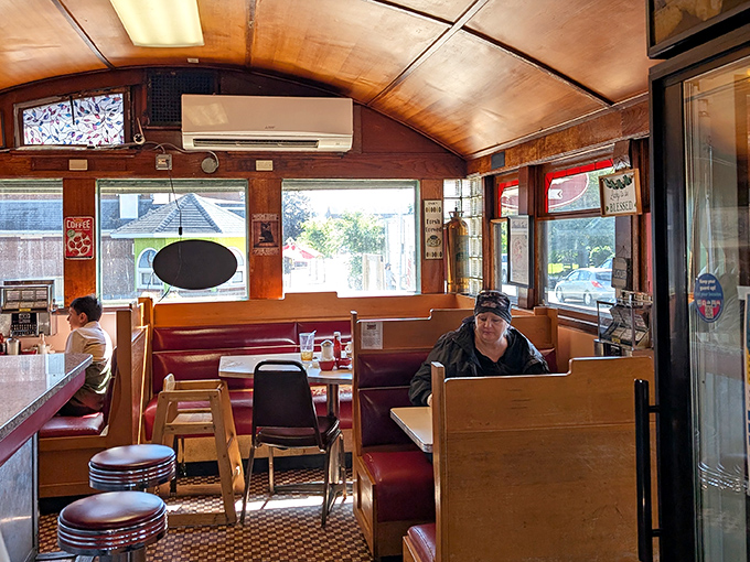 The barrel-vaulted ceiling creates an embrace of warmth that matches the comfort food perfectly. 