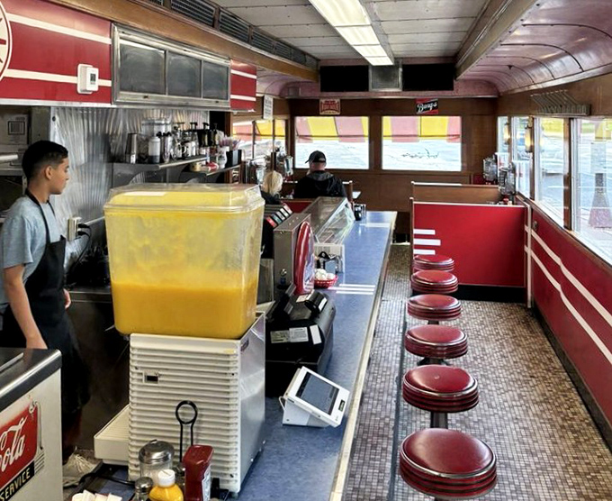 From this angle, you can almost hear the sizzle of the grill and smell the coffee that's been perfuming this railcar since before color TV. 
