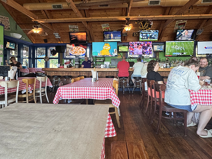 The dining room buzzes with anticipation as empty tables wait to become battlegrounds of butter, seasoning, and discarded shells.