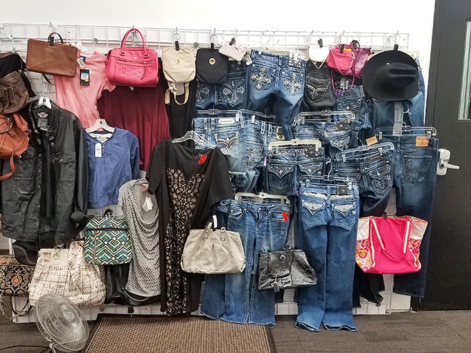 Denim dreams and accessory schemes! This wall of fashion possibilities proves one shopper's castoffs become another's signature style.