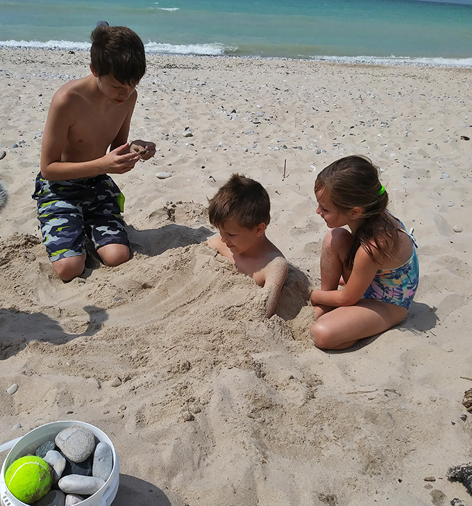 Childhood's universal language: sand engineering projects that combine serious concentration with the joy of getting gloriously dirty.