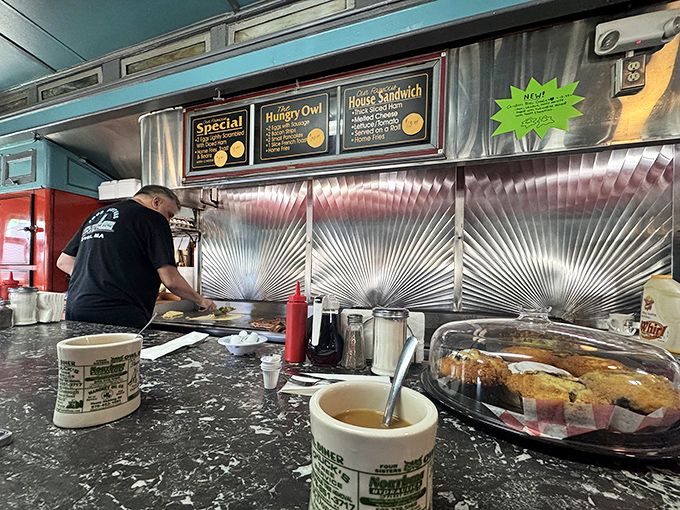 Where the magic happens! The open kitchen design lets you witness breakfast artistry in action while sipping your perfectly refilled coffee.