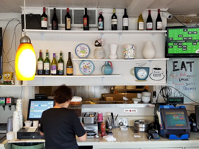 Behind every great diner is a shelf system that somehow makes wine bottles and coffee mugs look like they belong together.