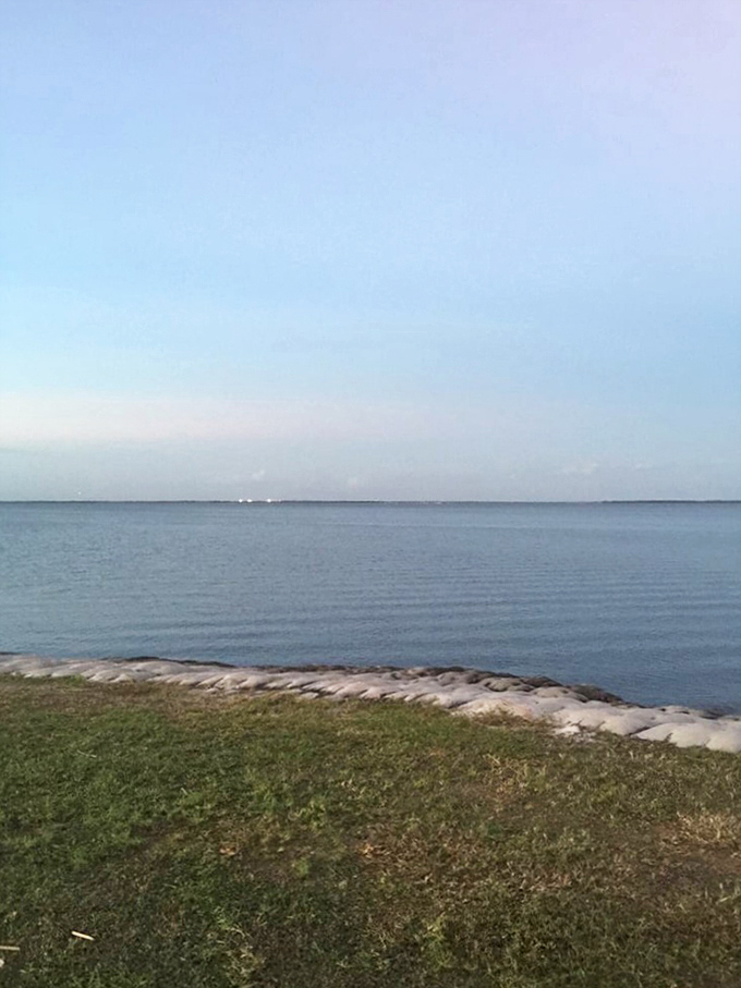 Horizon meets sky in a seamless blend of blues. Who needs ocean waves when tranquility comes in freshwater form?