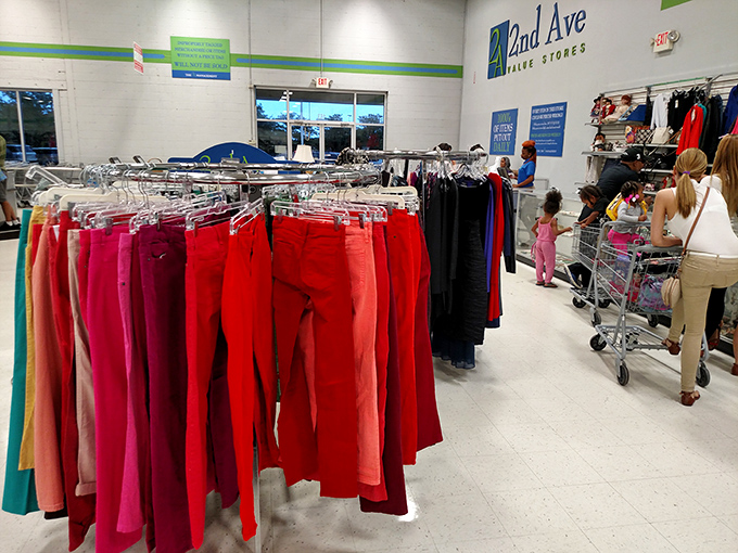 A kaleidoscope of women's pants arranged by color &ndash; red-hot deals in every sense of the word.