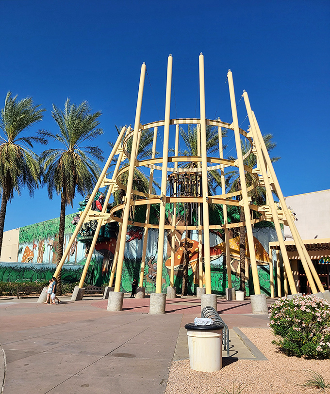 The towering bamboo structure creates an impressive focal point that makes you wonder if you're still in a mall or have somehow wandered onto a movie set.