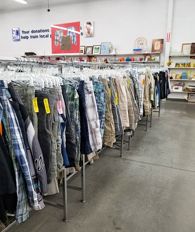 Men's shorts and casual wear lined up like soldiers, ready to march into someone's weekend wardrobe rotation.