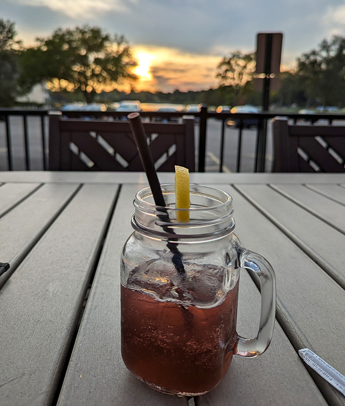 Sunset views and a mason jar cocktail on the patio—proof that Bill's knows ambiance is as important as what's on your plate.