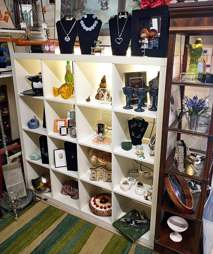 Curated chaos at its finest&mdash;each cubby holds a different world, from vintage glassware to miniature houses waiting for new stories.