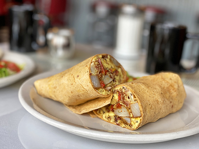 The breakfast burrito that launched a thousand road trips. Stuffed with fluffy eggs and potatoes, it's the edible equivalent of a warm Colorado morning.