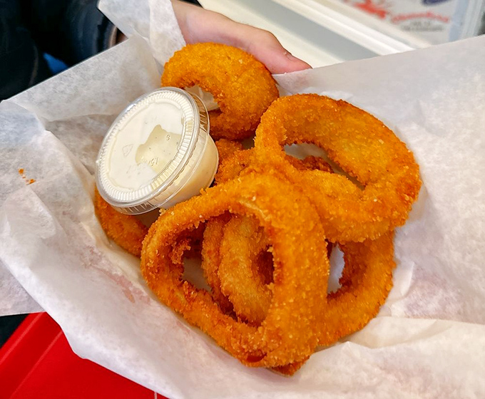 These aren't just onion rings &ndash; they're golden halos of happiness with a crunch that echoes across Fisherman's Wharf.
