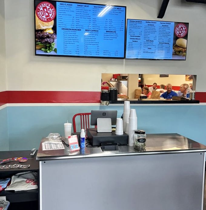 Command central where burger dreams become reality. The menu board promises simple pleasures without unnecessary complications.