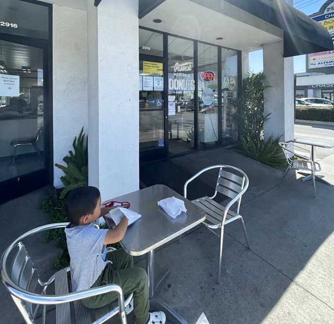 Even the outdoor seating at Primo's has a charming simplicity—a place where generations have paused to experience donut nirvana.