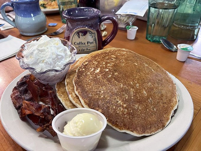 Pancakes that could double as pillows, bacon cooked to that magical point between chewy and crisp. Breakfast nirvana achieved.
