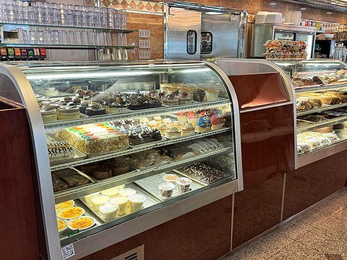 The dessert case at Minella's&mdash;where willpower goes to die and "I'll just have coffee" turns into "and a slice of that... and that."