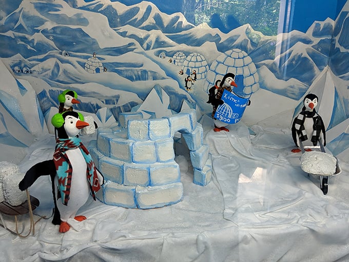 These cheerful penguins building igloos capture that retro roadside attraction charm perfectly&mdash;kitschy, delightful, utterly sincere about it.