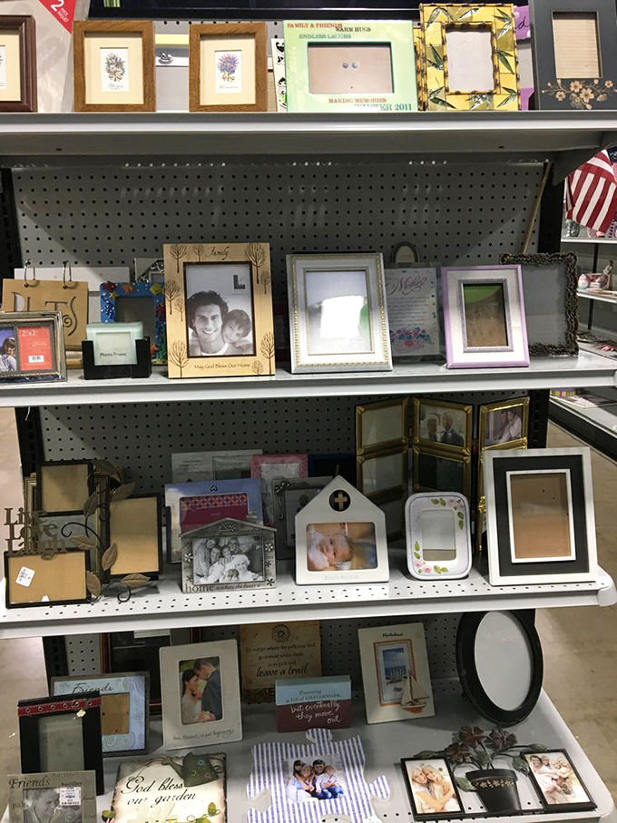 Picture frames that once held someone else's memories, now blank canvases ready for your family photos and vacation snapshots.