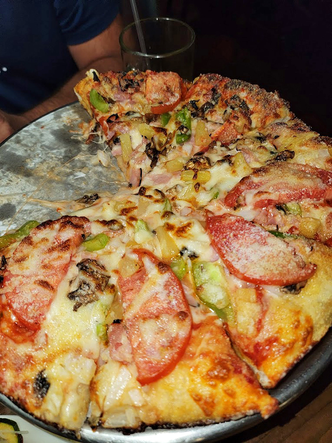 Pizza that doesn't need artisanal pretension to be delicious – just the right balance of cheese, toppings, and a crust that knows its job.