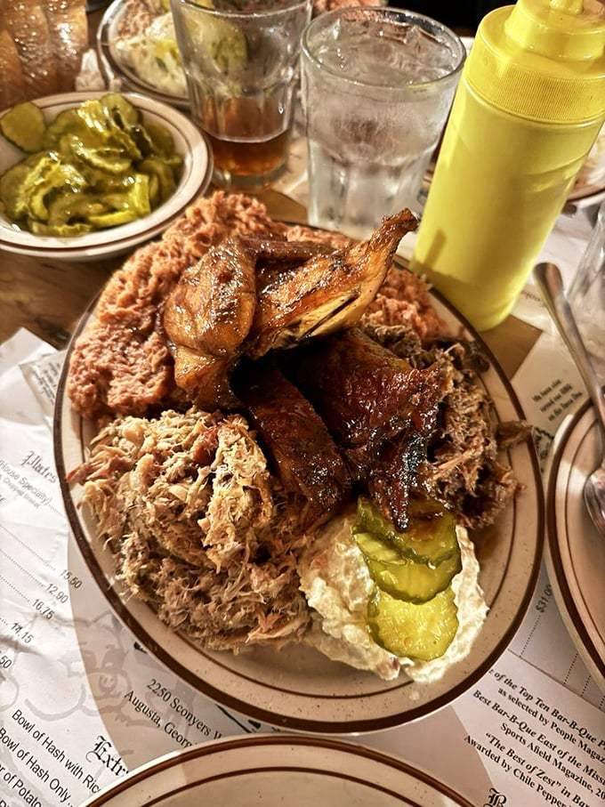When your plate looks like a barbecue sampler from heaven, complete with chicken, ribs, and pulled pork in perfect harmony.