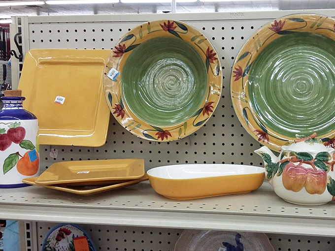 Sunny yellow plates meet earthy green bowls in the dishware section. Someone's discarded wedding registry items become your kitchen's new statement pieces.