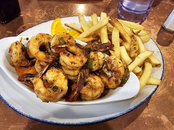 These prawns aren't just cooked—they're transformed into buttery, herb-flecked morsels of joy that make you forget your table manners.