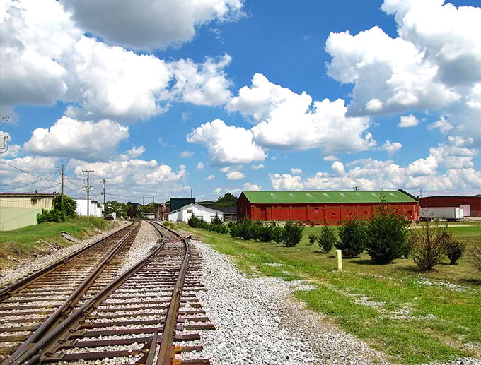 Railroad tracks stretch toward the horizon, a steel reminder of how Sweetwater connected to the wider world long before interstate highways.