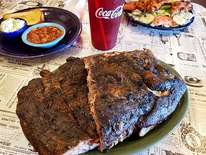 Ribs with a bark so perfect, they deserve their own museum exhibit. The smoke ring tells you everything you need to know about patience.