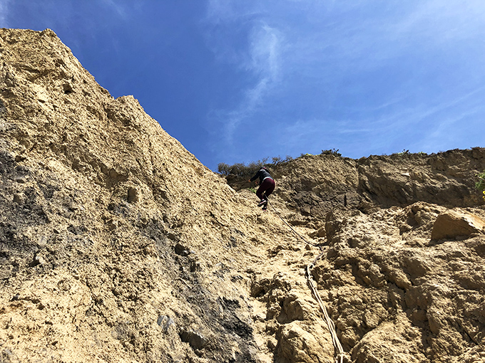 Not all beach access is created equal—sometimes the most rewarding shores require a bit of adventurous scrambling.