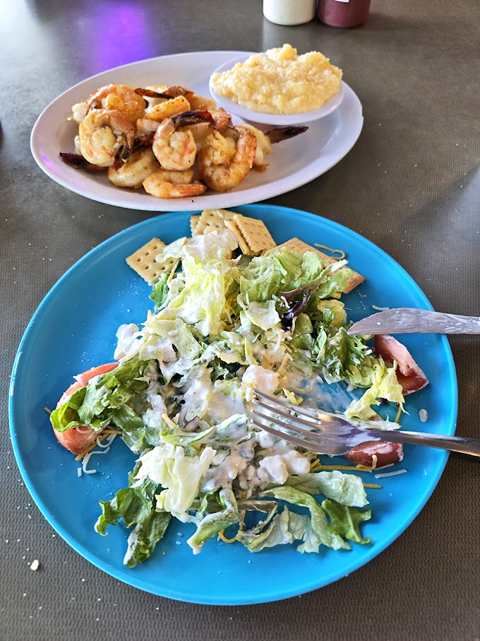 Fresh greens and seafood sharing a plate&mdash;nature's way of saying "balance is important, but so is flavor."