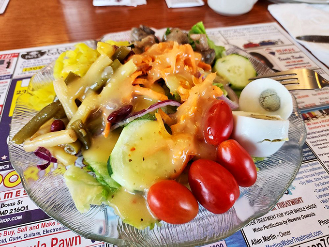 This garden salad isn't just an obligation to vegetables&mdash;it's a vibrant, fresh counterpoint to the diner's heartier offerings.