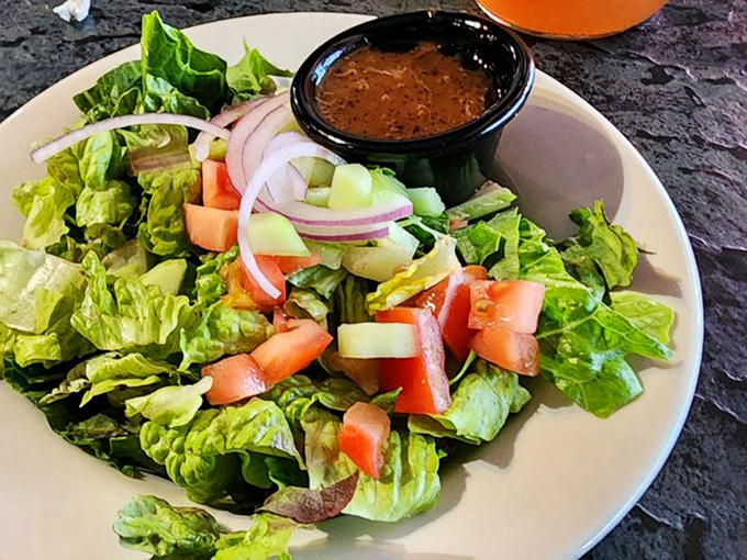 Even the salad looks like it's trying to say, "I'm healthy, but I understand I'm in a BBQ joint." That dressing is definitely not counting calories.