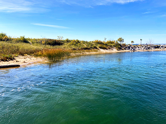 This shoreline curve embraces visitors like a warm hug from Mother Nature herself on good days. 