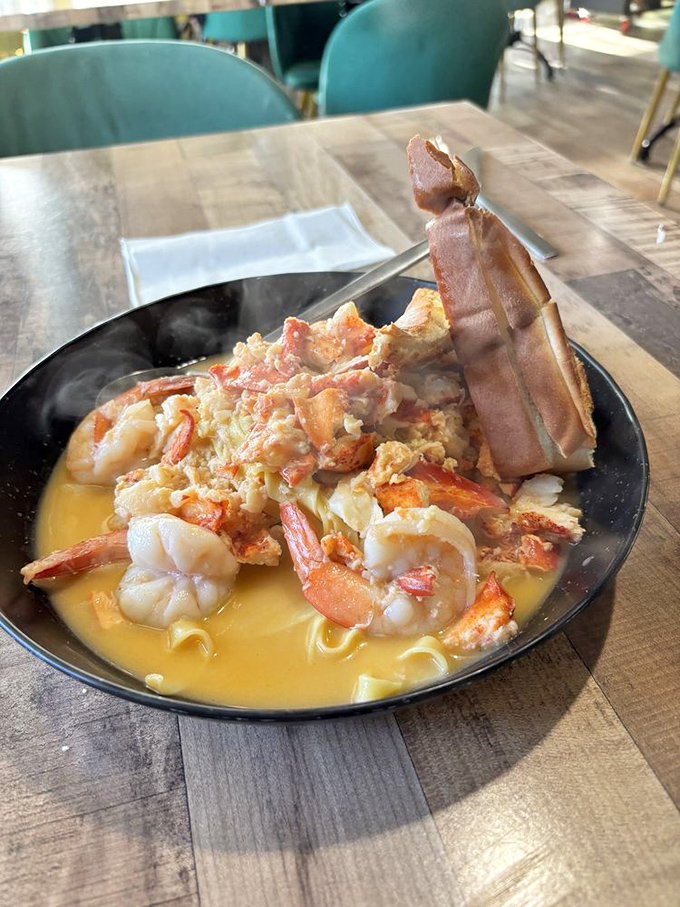 Lobster, shrimp, and butter sauce forming a holy trinity of seafood decadence. Whoever invented this deserves a Nobel Prize in Deliciousness.