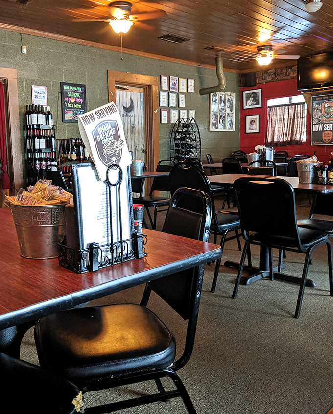 Simple tables, practical chairs, and a menu stand that says, "We're focusing on what's on your plate, not what's on our walls."