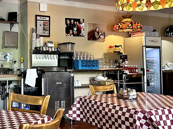 Where pizza magic happens. The self-service station reveals the practical side of a restaurant that's been perfecting its craft for generations.