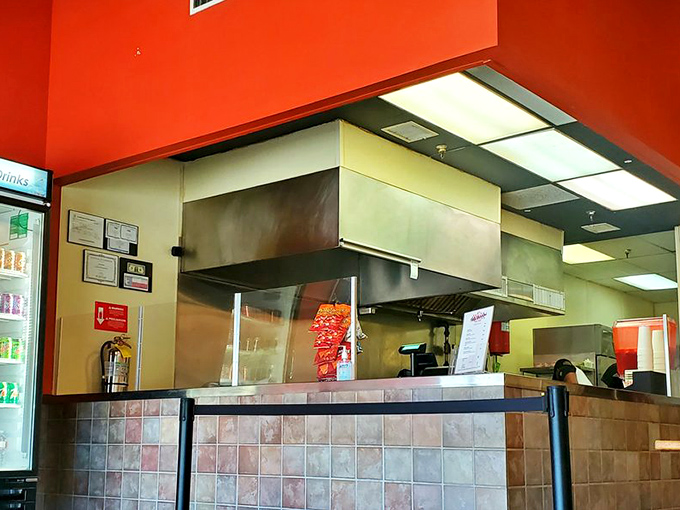 Where the magic happens&mdash;this open kitchen setup lets you witness the rhythmic dance of spatulas that transforms simple ingredients into edible joy.