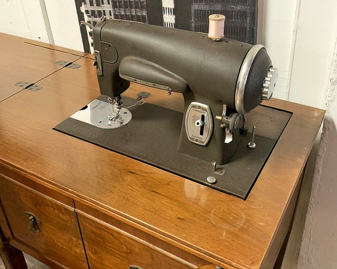 This vintage sewing machine has probably created more outfits than Project Runway, and it's still ready for its next masterpiece.
