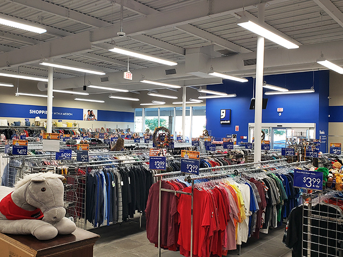 Another view of the expansive clothing section reveals the impressive scale of this Danbury Goodwill, where new inventory arrives daily.