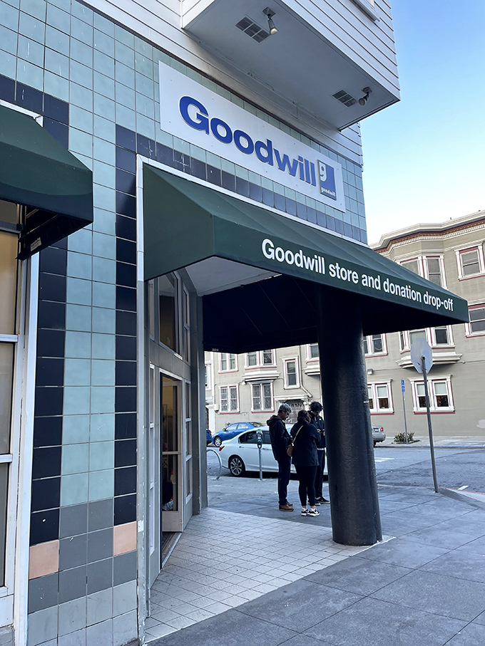 The iconic blue sign beckons bargain hunters inside, a beacon of hope in a city of $7 toast.