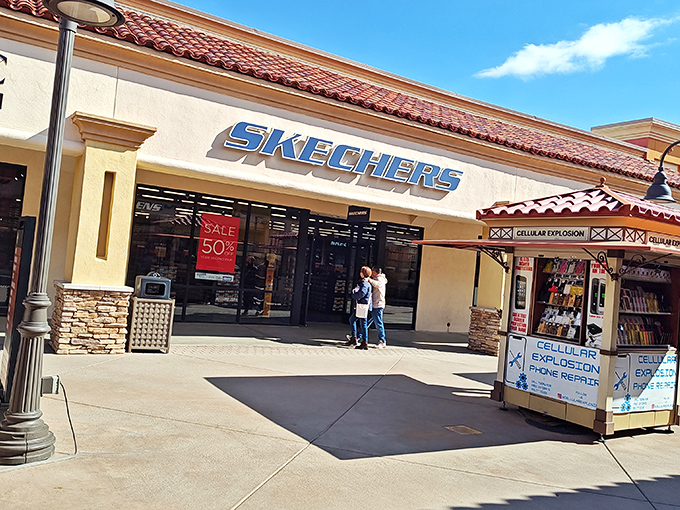 Skechers announces its 50% off sale like a beacon to comfort-seeking feet that have traversed miles of premium outlet territory.